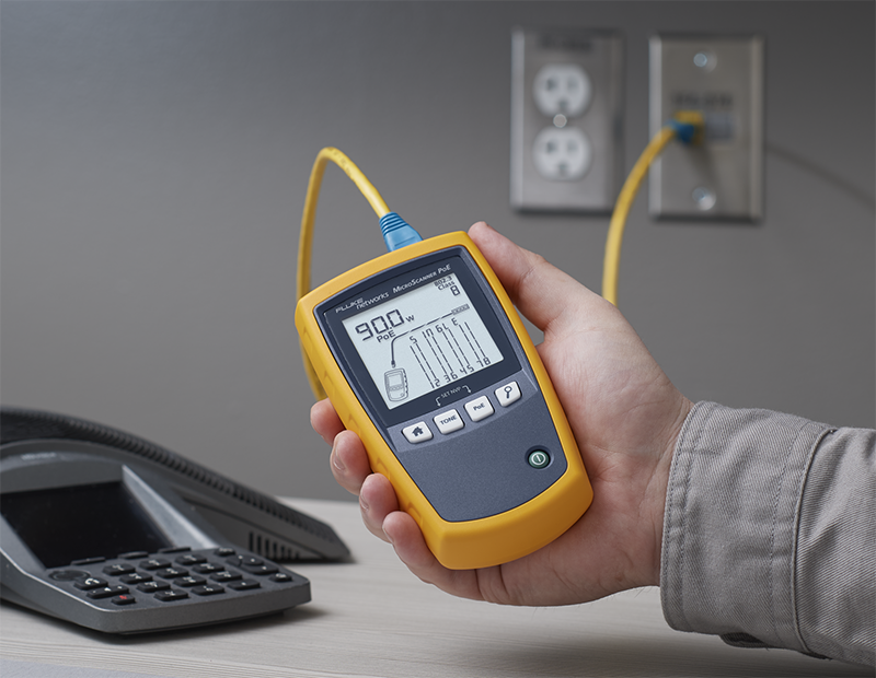 Handheld Device Checks PoE Power Supply - Commercial Property Executive